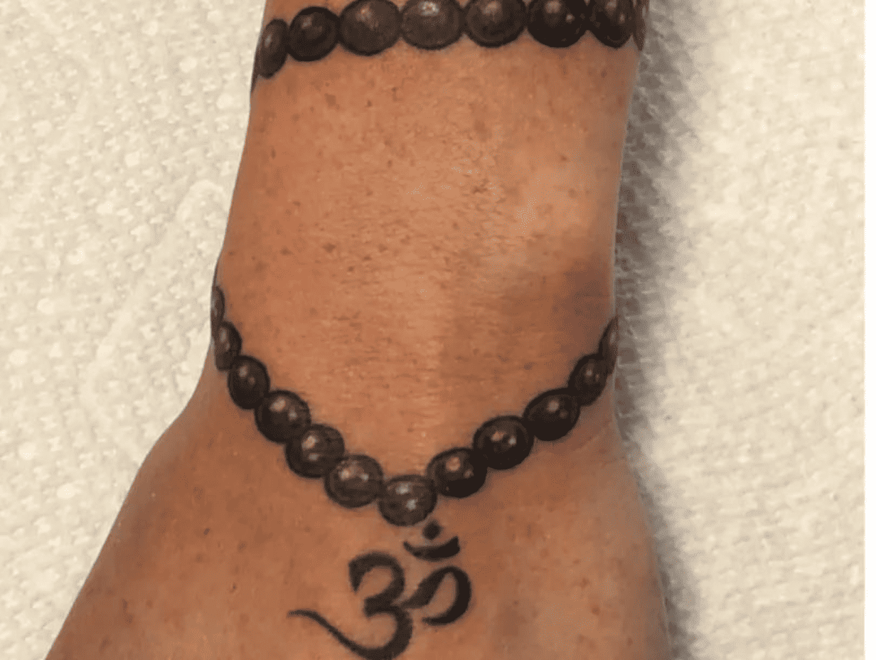 11 Awesome Mala Bead Tattoo Designs + Meaning